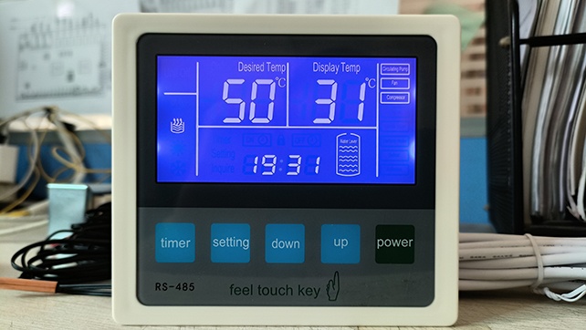 Room thermostat for heat pump and air conditioner